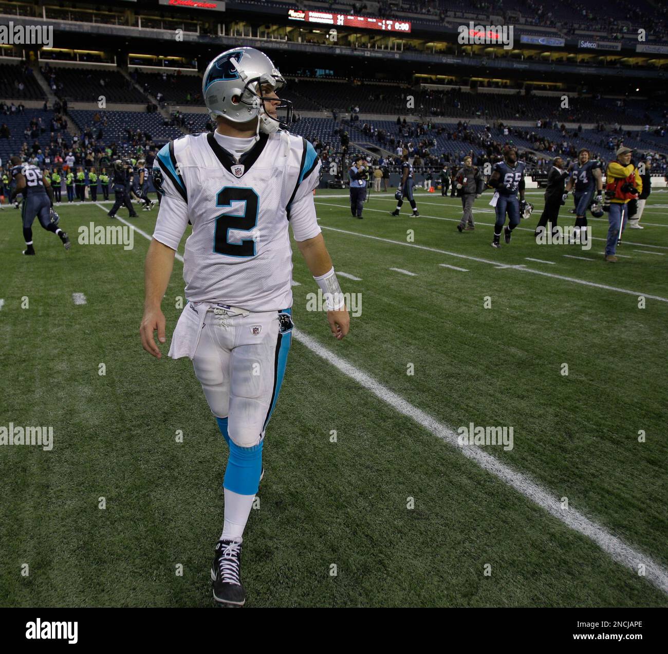Carolina Panthers quarterback Jimmy Clausen walks off the field ...