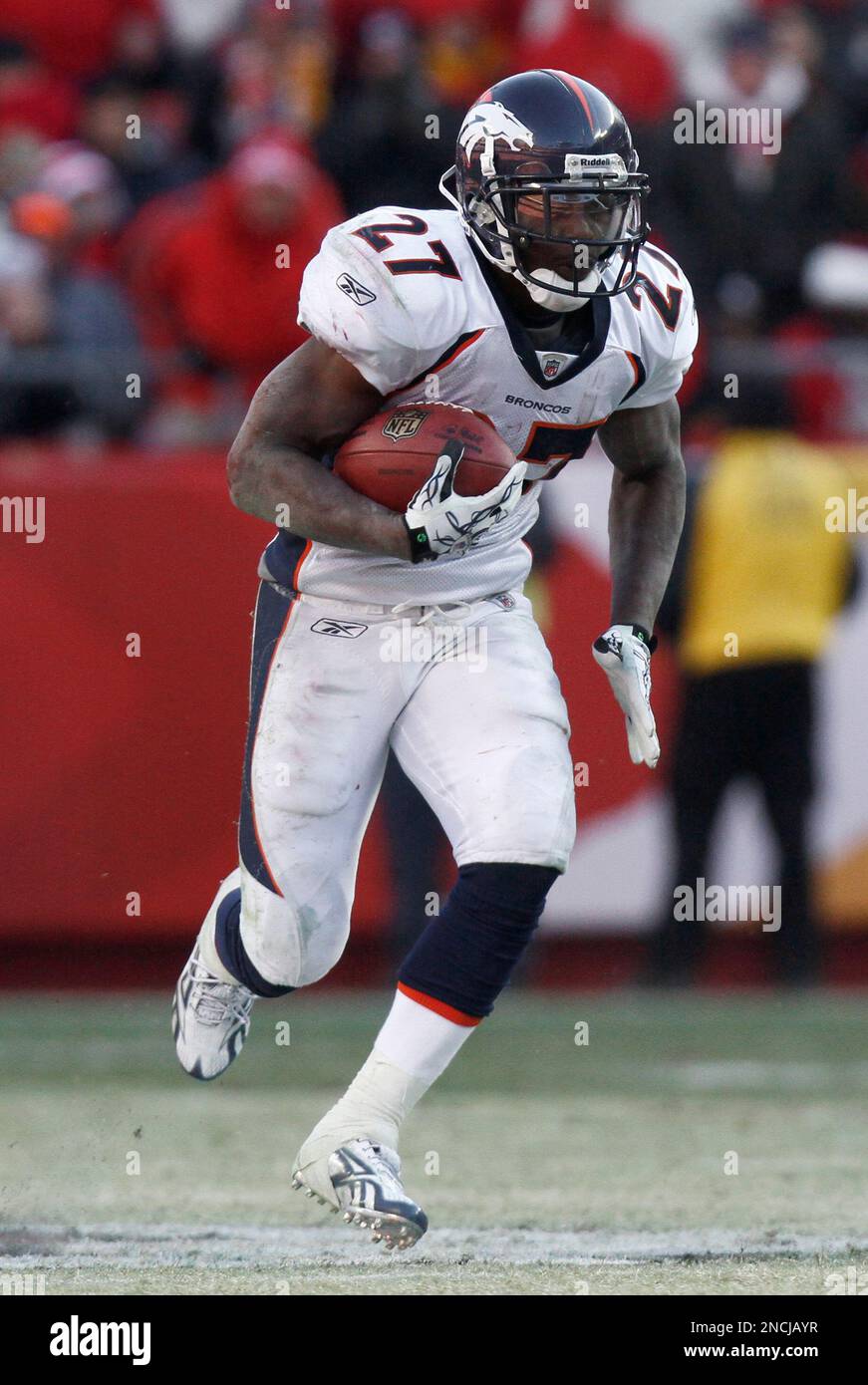 Denver Broncos running back Knowshon Moreno (27) runs for extra yards ...