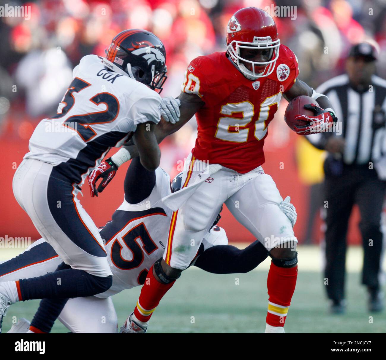 Kansas City Chiefs running back Thomas Jones (20) runs for extra yards ...