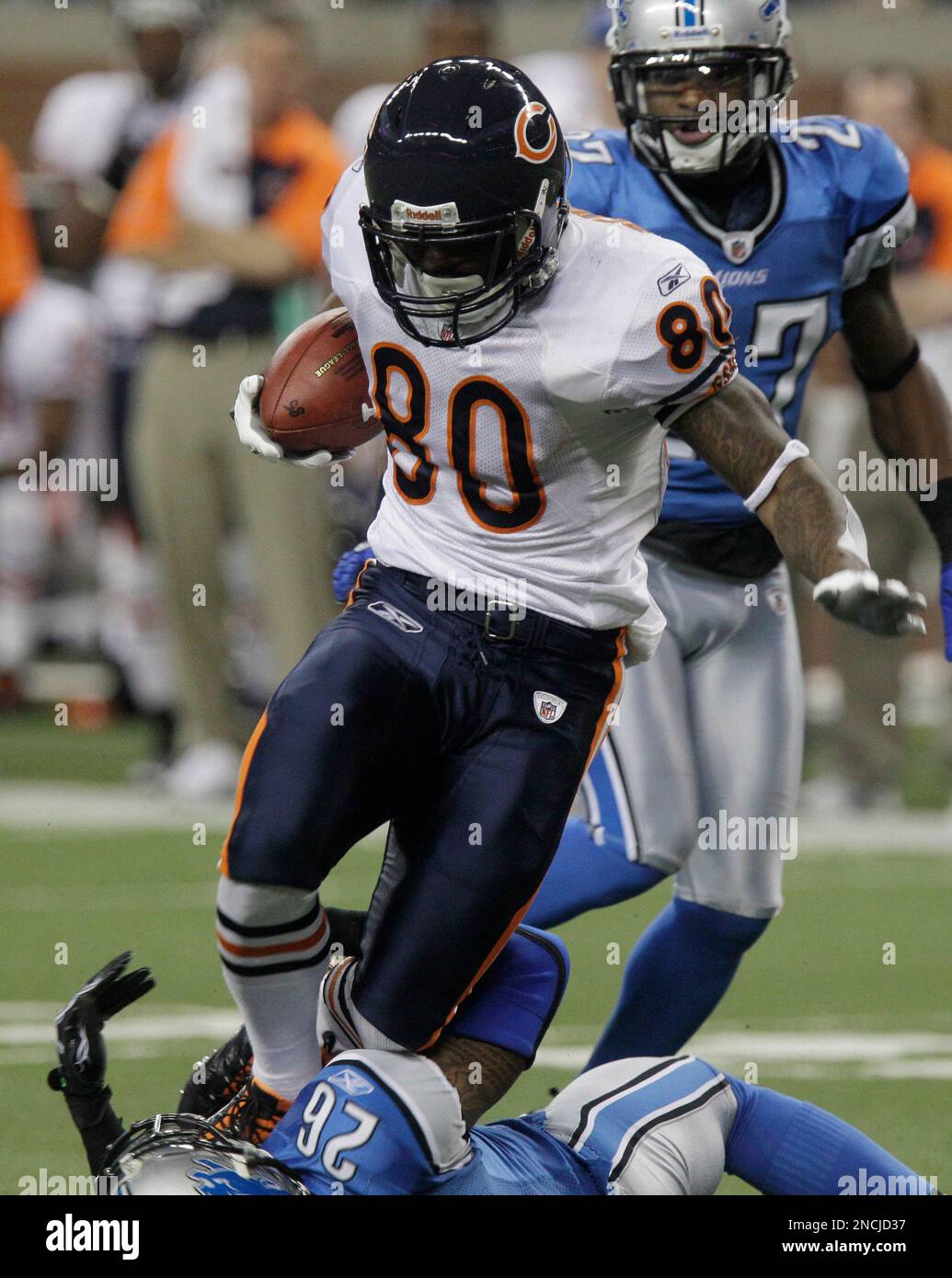 Chicago Bears wide receiver Earl Bennett (80) is stopped by Detroit ...