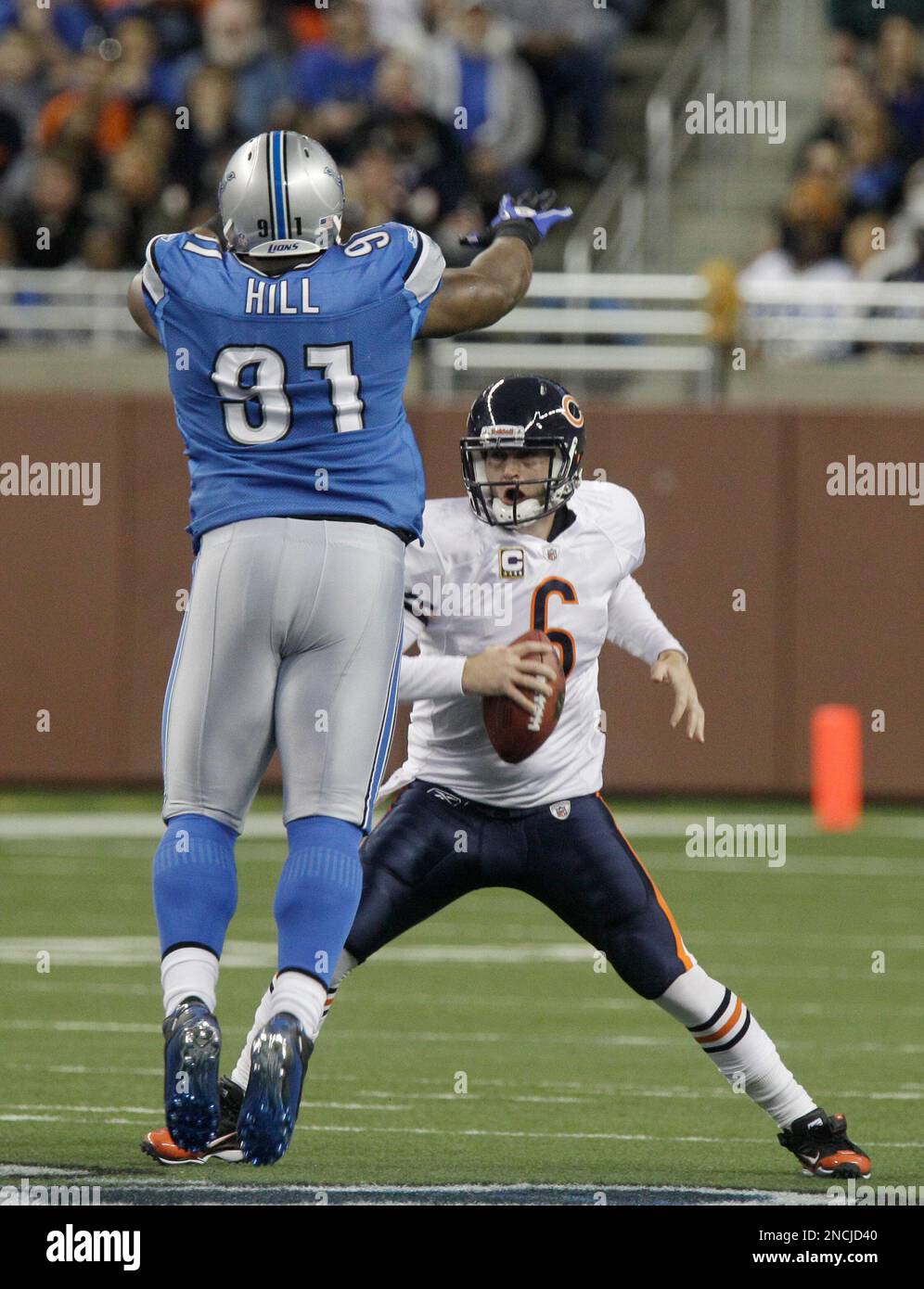 Detroit Lions defensive tackle Sammie Lee Hill (91) closes in on ...