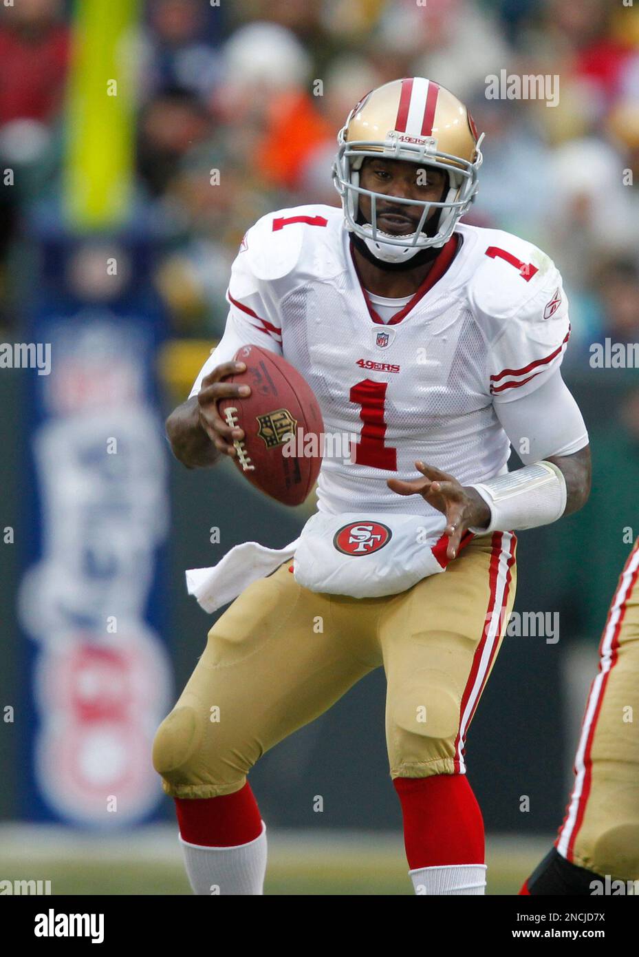 San Francisco 49ers quarterback Troy Smith scrambles during the second ...