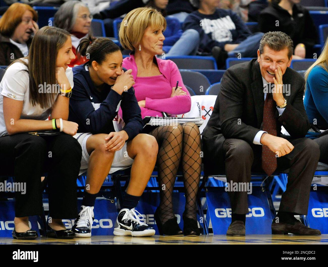 Connecticut's head coach Geno Auriemma, right, shares a light moment ...