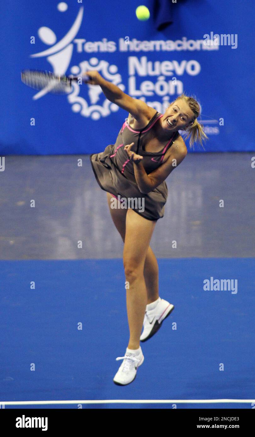 Russia's Maria Sharapova serves against countrywoman Vera Zvonareva ...