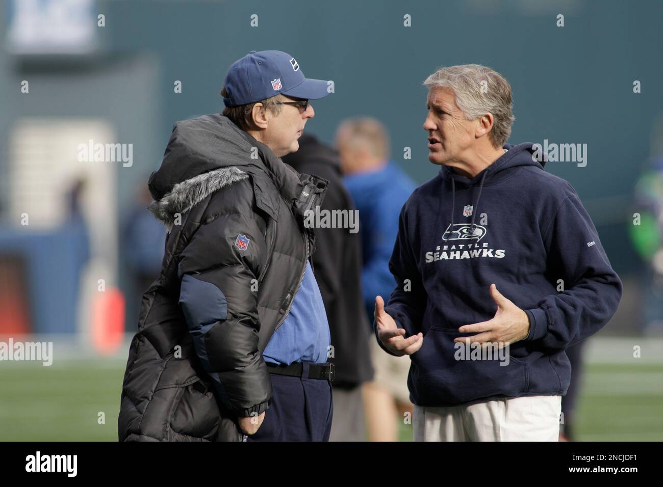Seattle Seahawks owner Paul Allen talks with Seattle Seahawks head ...