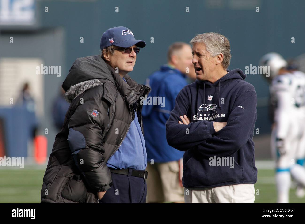 Seattle Seahawks owner Paul Allen talks with Seattle Seahawks head ...