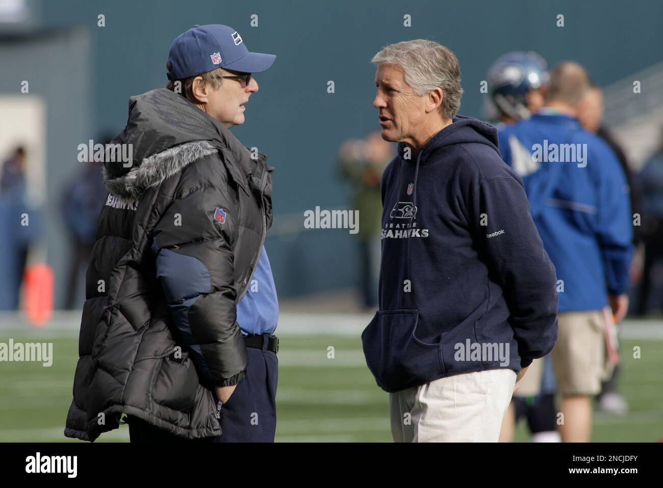Seattle Seahawks owner Paul Allen talks with Seattle Seahawks head ...