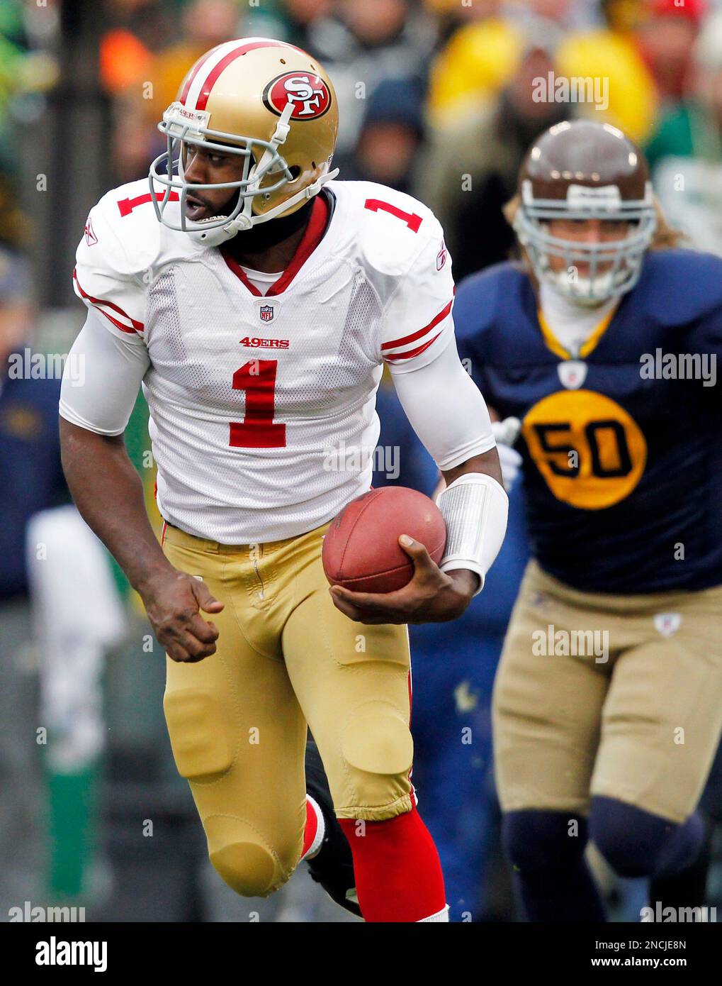 San Francisco 49ers quarterback Troy Smith runs during the first half ...