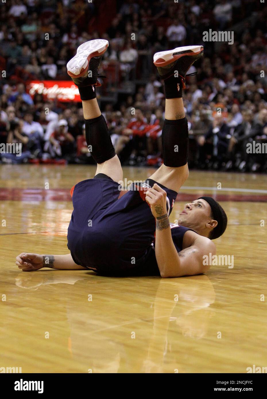 Atlanta Hawks guard Mike Bibby (10) falls on the court in the fourth ...