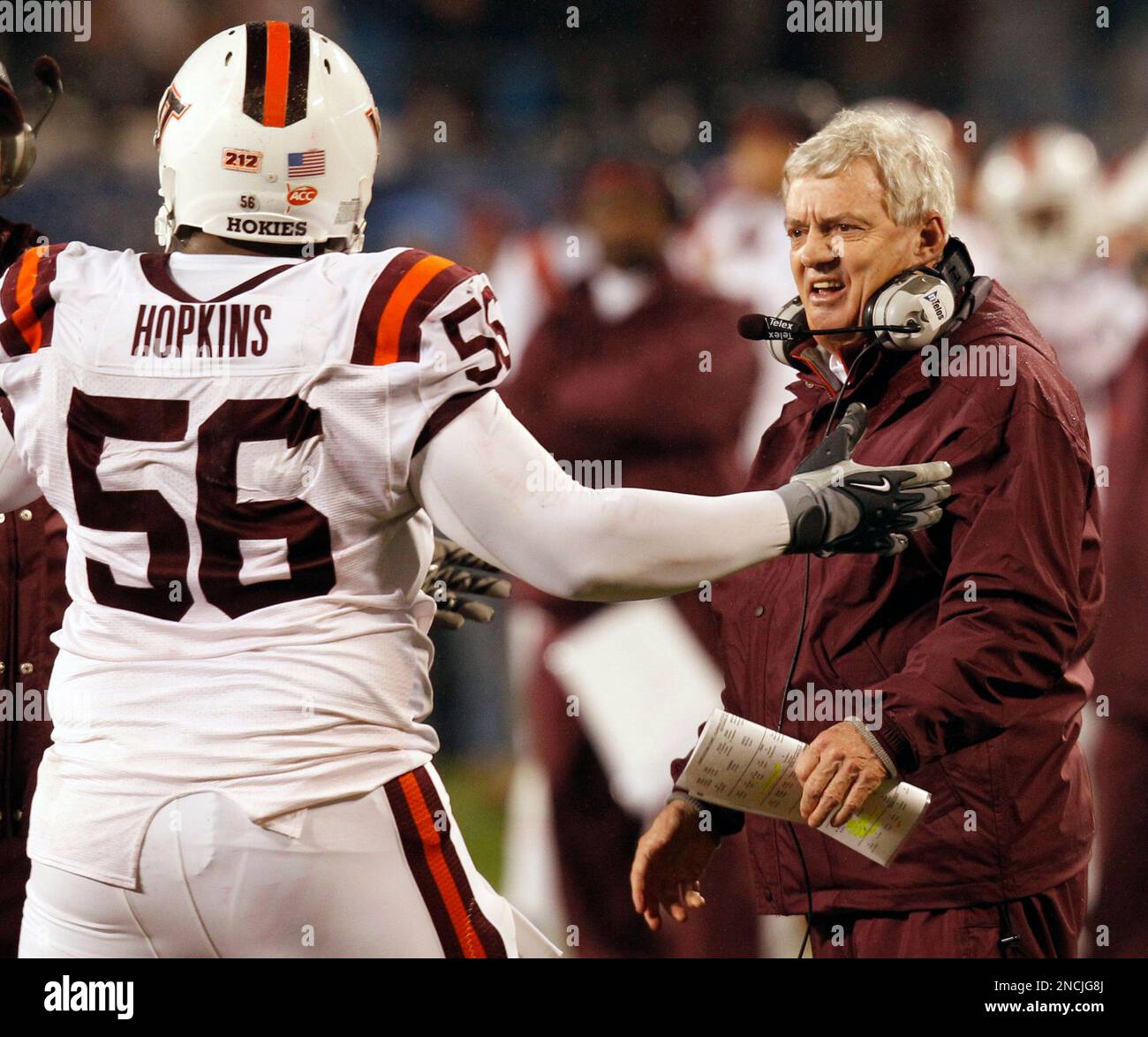 Virginia Tech head coach Frank Beamer, right, shouts to Antoine Hopkins ...