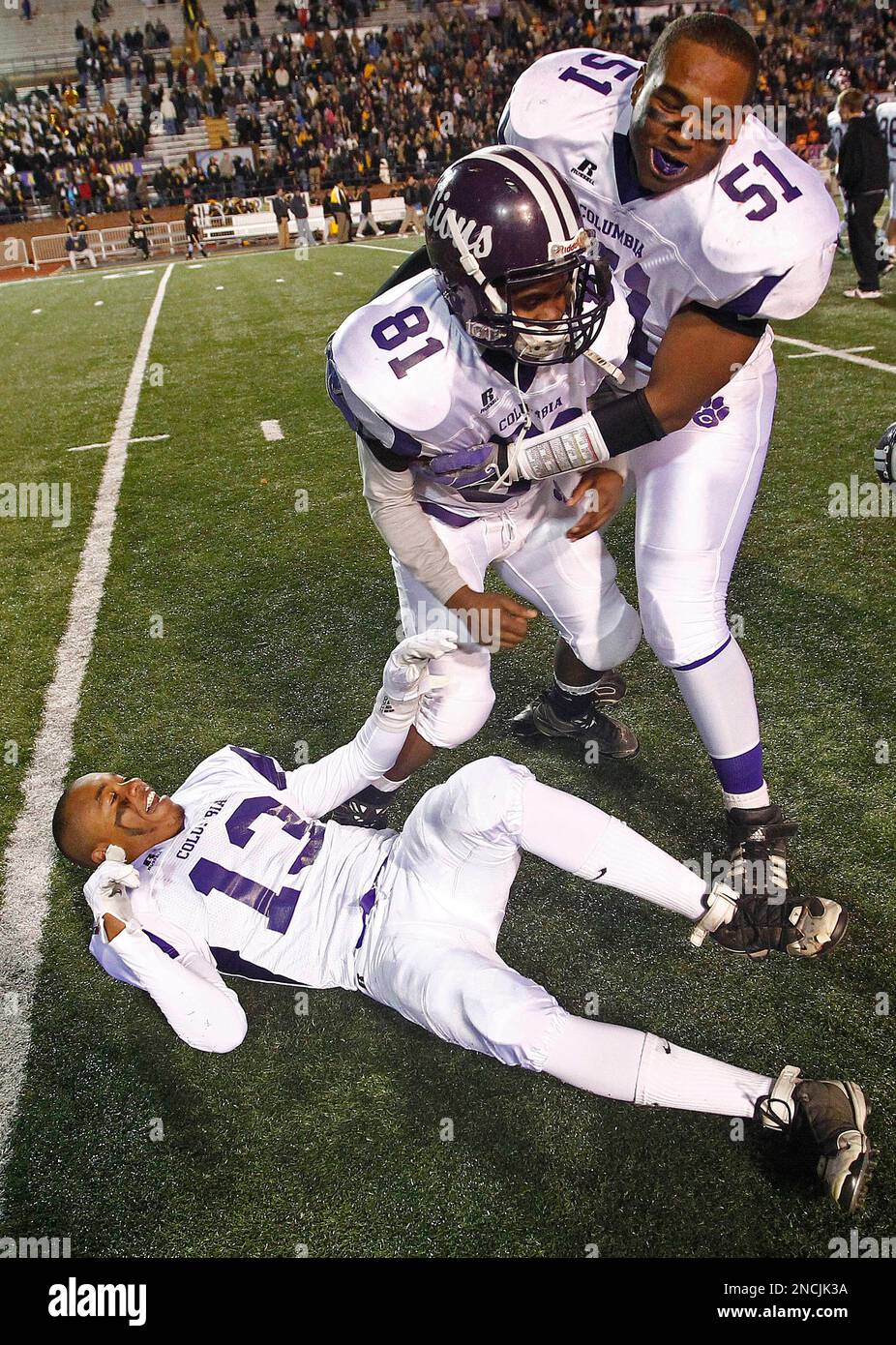 Columbia players Travis Booker (13) Codie Bauman (81) and Donovan ...