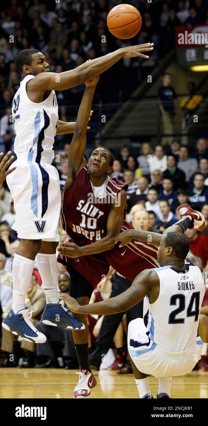 Saint Joseph's Langston Galloway (10) tries to get a shot between ...