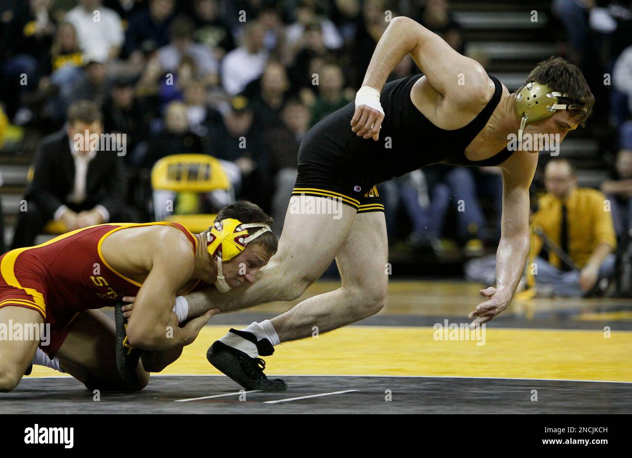 Iowa's Derek St. John, right, escapes from Iowa State's Trent ...