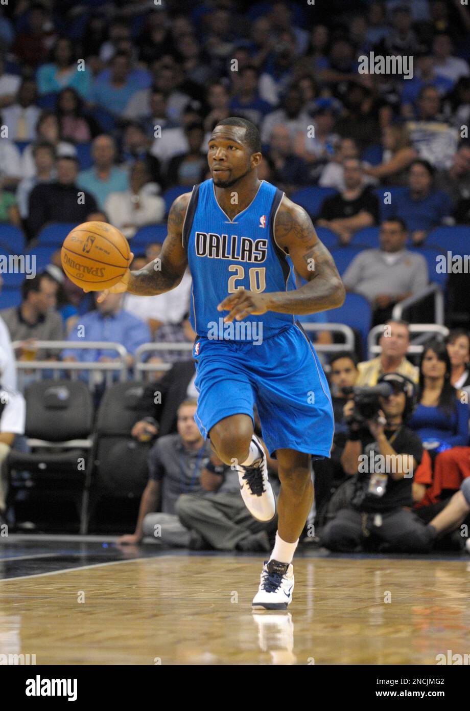 Dallas Mavericks guard Dominique Jones pushes the ball up the court ...
