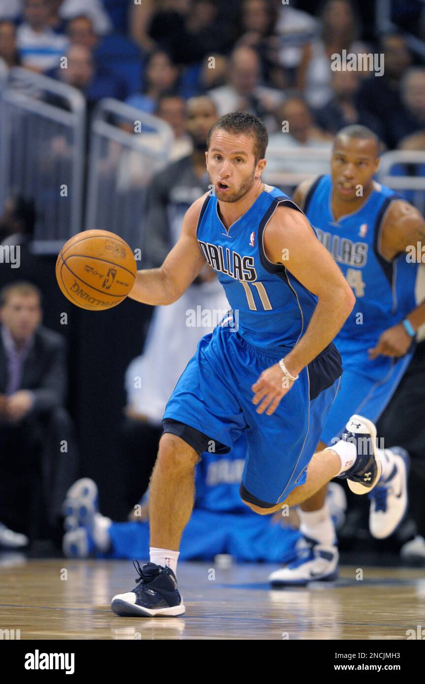 Dallas Mavericks guard Jose Barea, of Puerto Rico, pushes the ball up ...