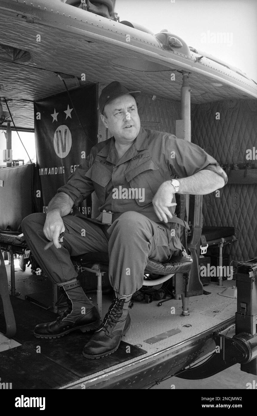 U.S. Secretary of Defense Melvin R. Laird sits aboard a helicopter at ...