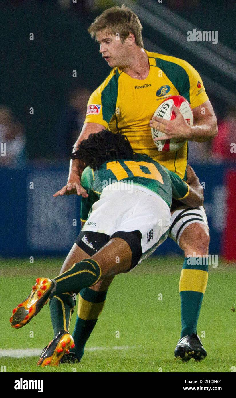 South Africa's Cecil Africa, tackles Australia's Trent Dyer, top ...