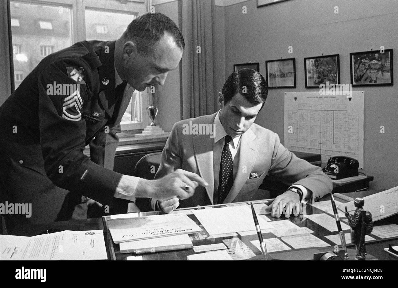 American actor George Hamilton, right, in Munich, Nov. 8, 1966, after ...