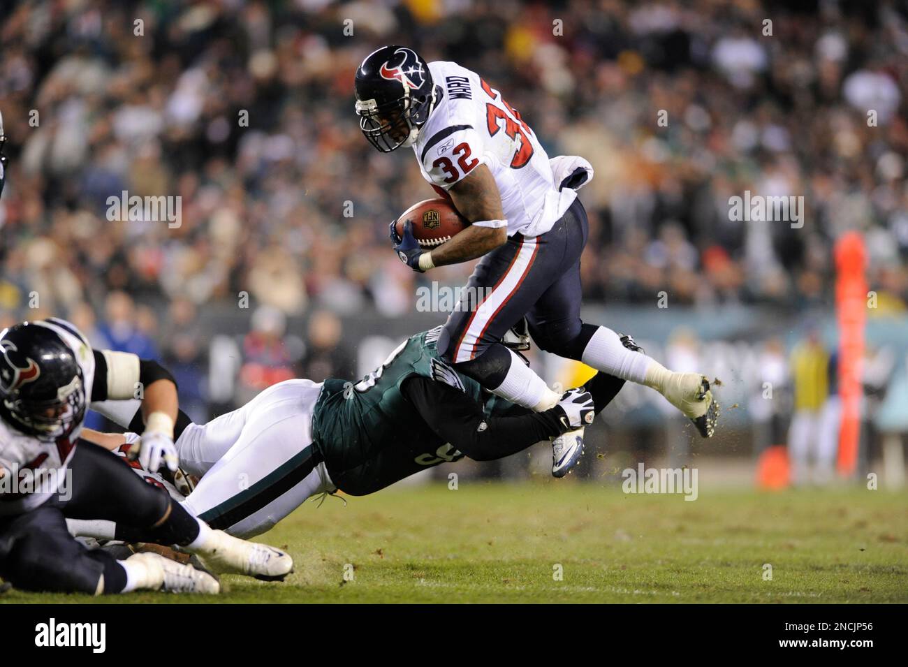 Houston Texans running back Derrick Ward is tackled by Philadelphia ...
