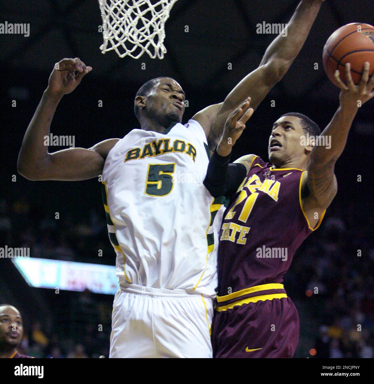 Arizona State's Keala King (21) drives against Baylor forward Perry ...