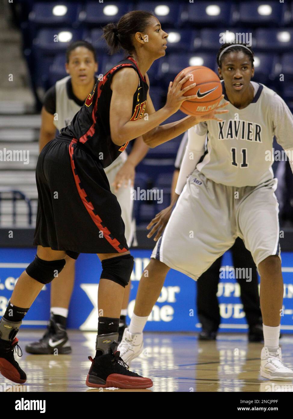 Southern California guard Briana Gilbreath, left, looks to pass around ...