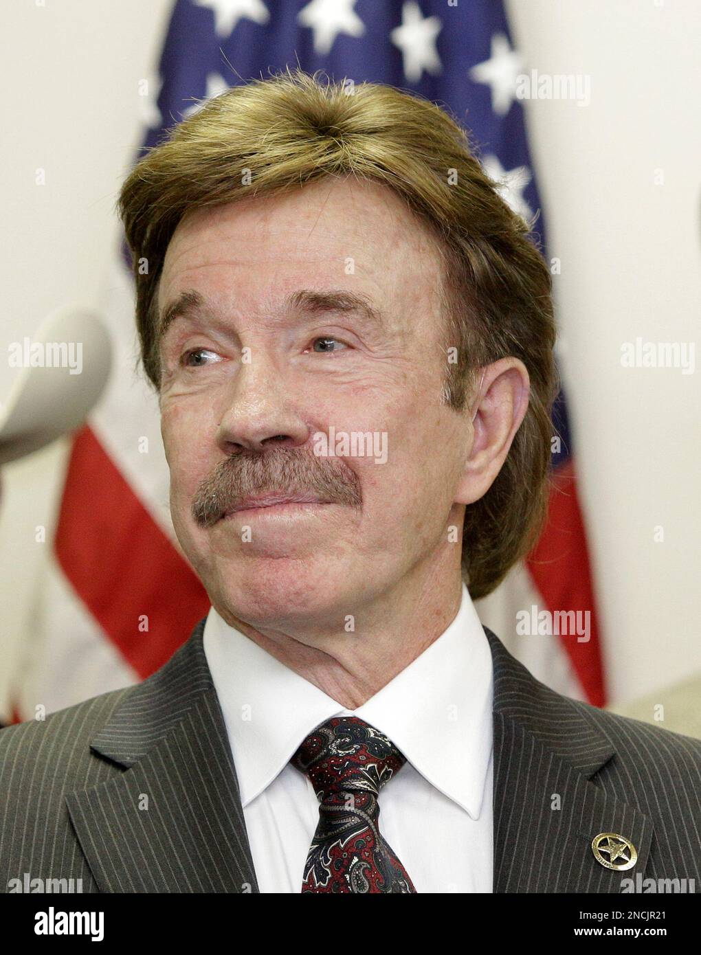 Actor Chuck Norris wears a honorary Texas Rangers law enforcement pin ...