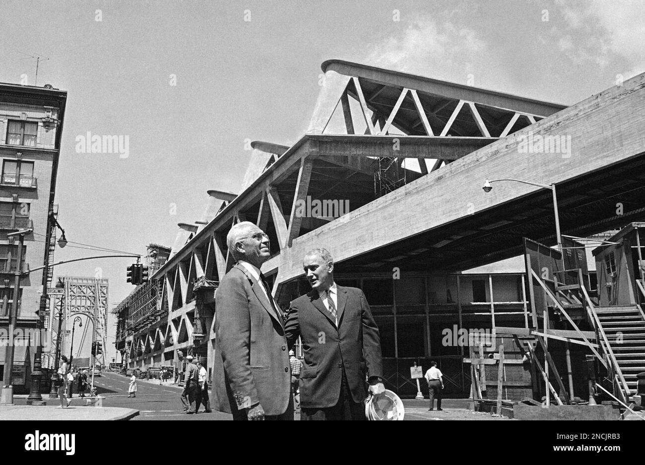 PItalian engineer-architect Pier Luigi Nervi, left, surveys progress on ...
