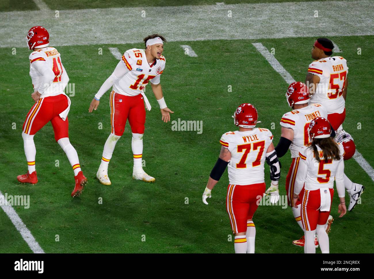 Kansas City Chiefs quarterback Patrick Mahomes (15 ) cheers on his ...