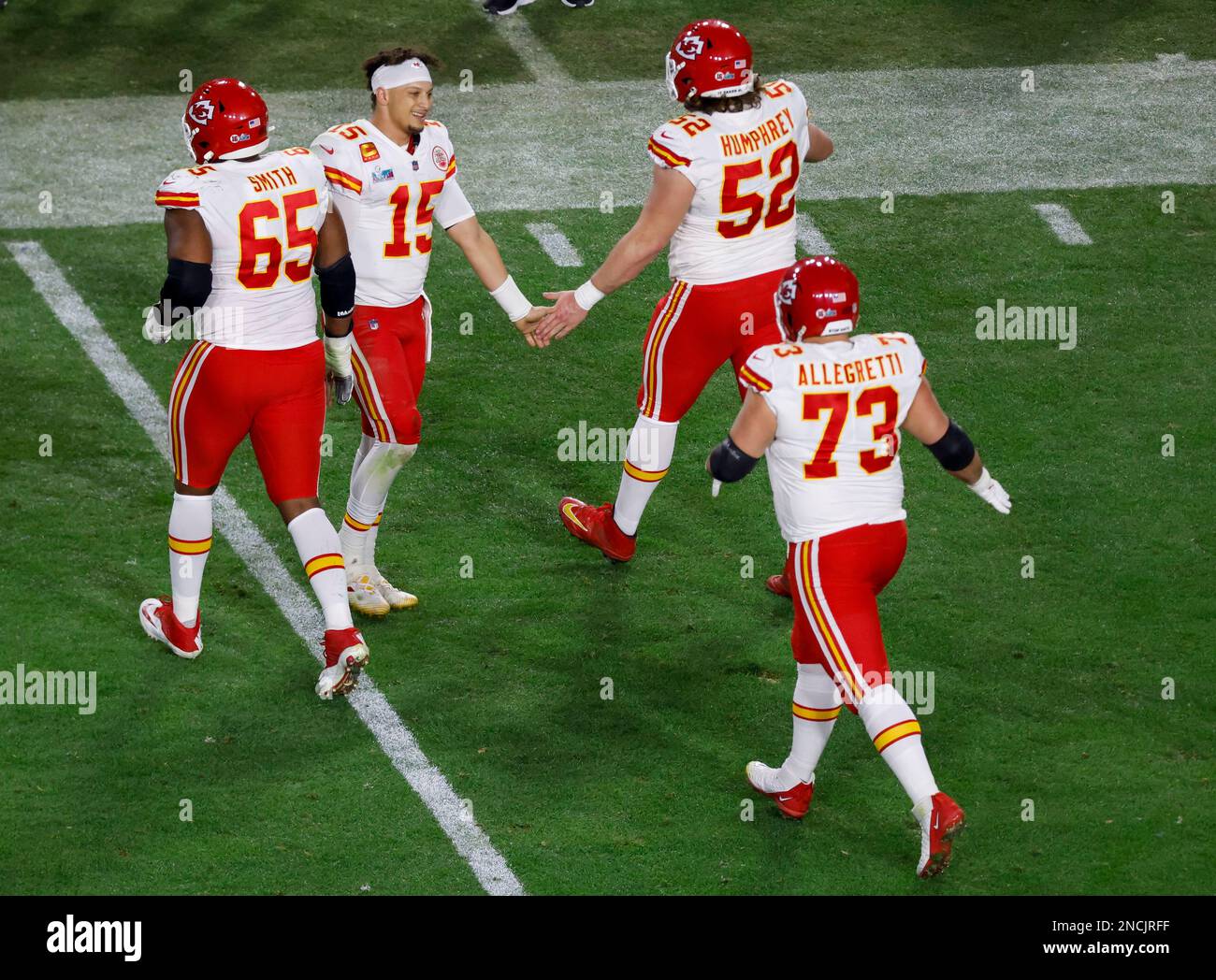 Kansas City Chiefs quarterback Patrick Mahomes (15 ) cheers on his ...
