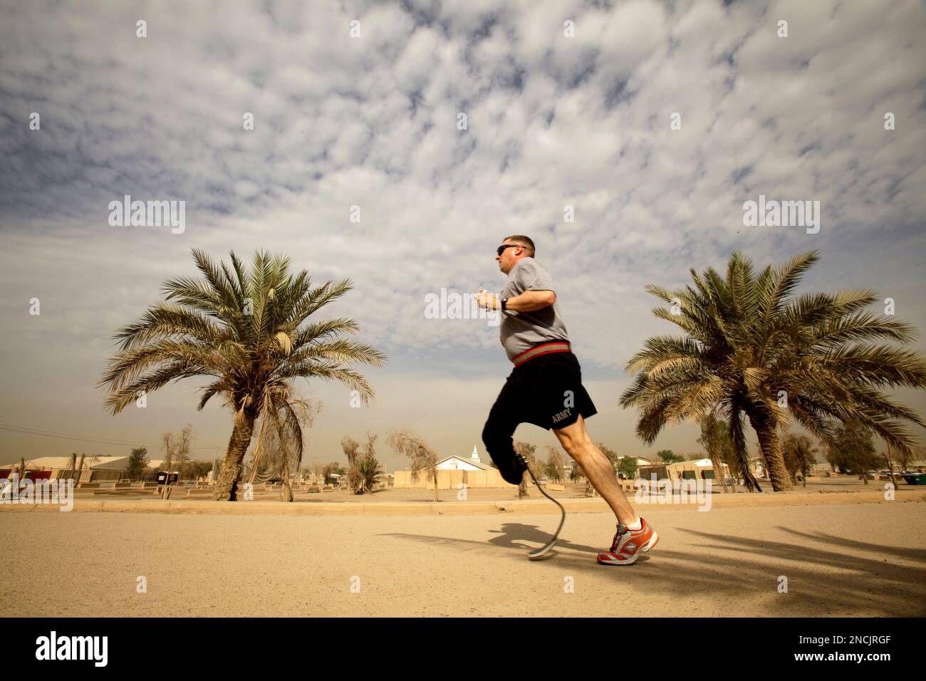 U.S. Army Maj. David Rozelle wears a specialized prosthetic leg for ...