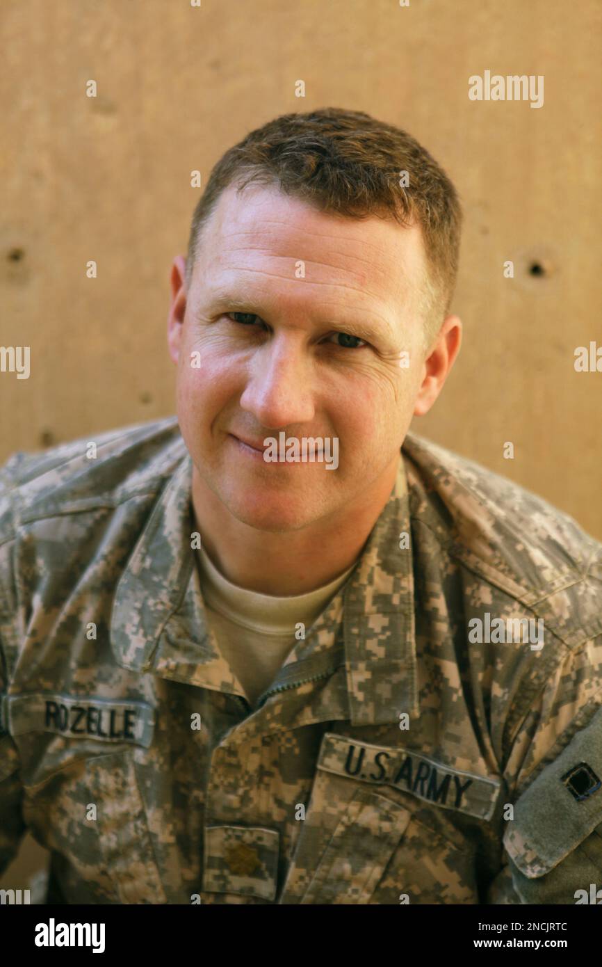 U.S. Army Maj. David Rozelle poses for a portrait at Camp Victory in ...