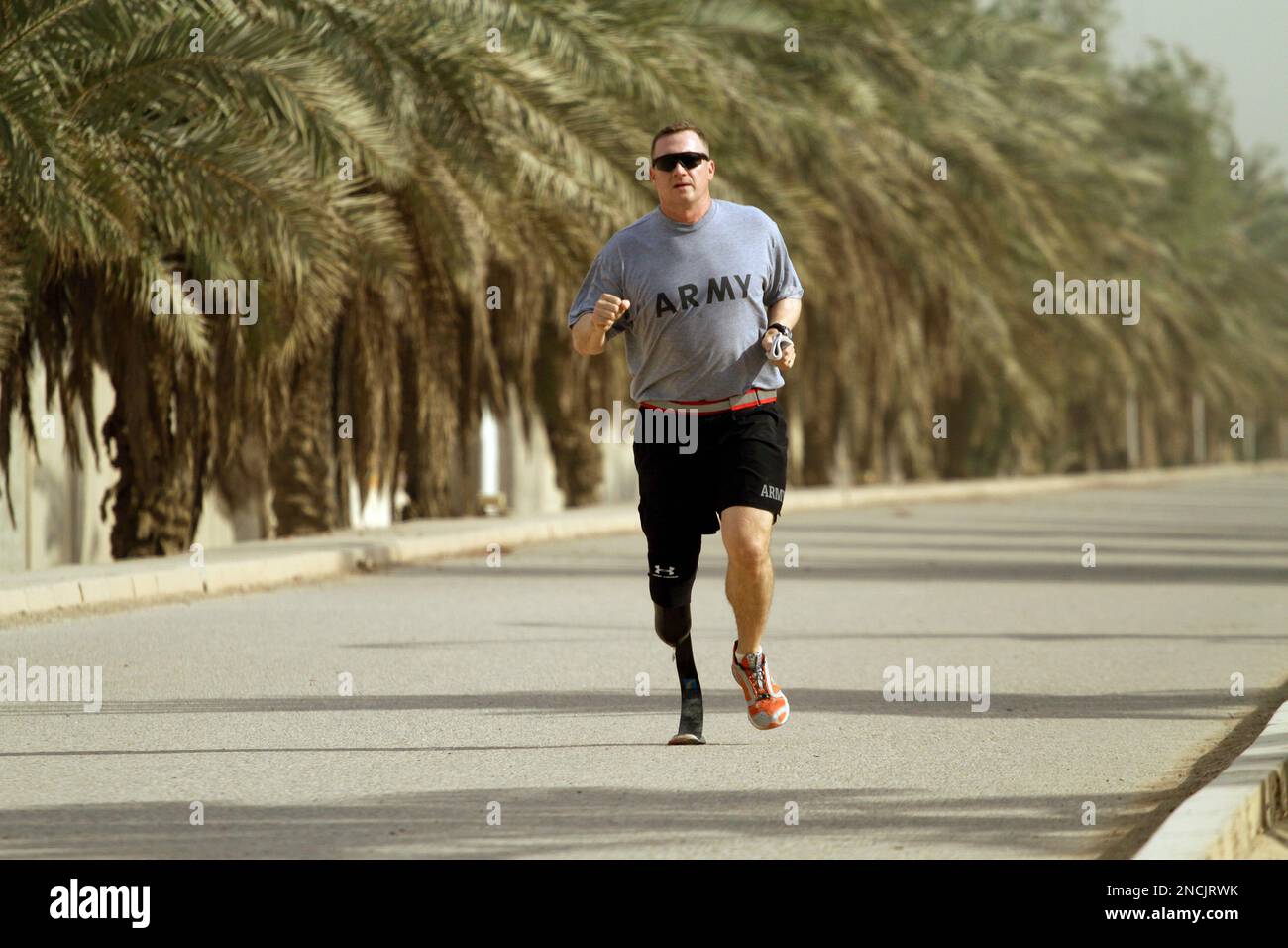 U.S. Army Maj. David Rozelle wears a specialized prosthetic leg for ...