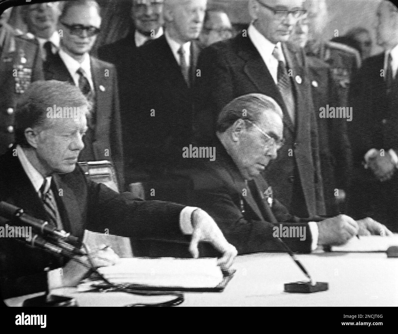 U.S. President Jimmy Carter turns page of treaty he and Soviet ...