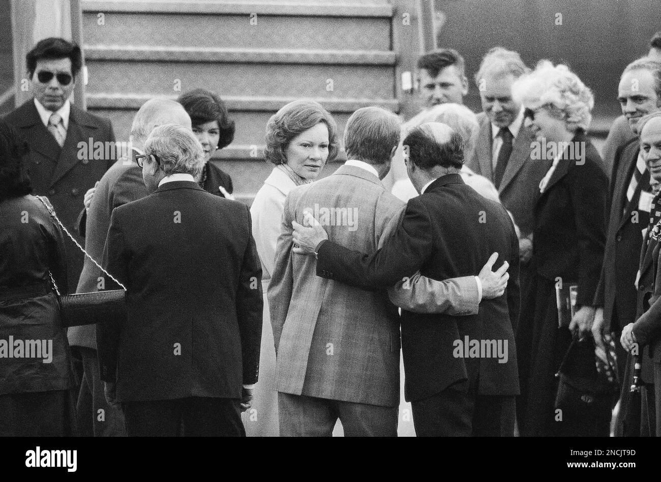 President Jimmy Carter and Prime Minister Menachem Begin, right, hug ...