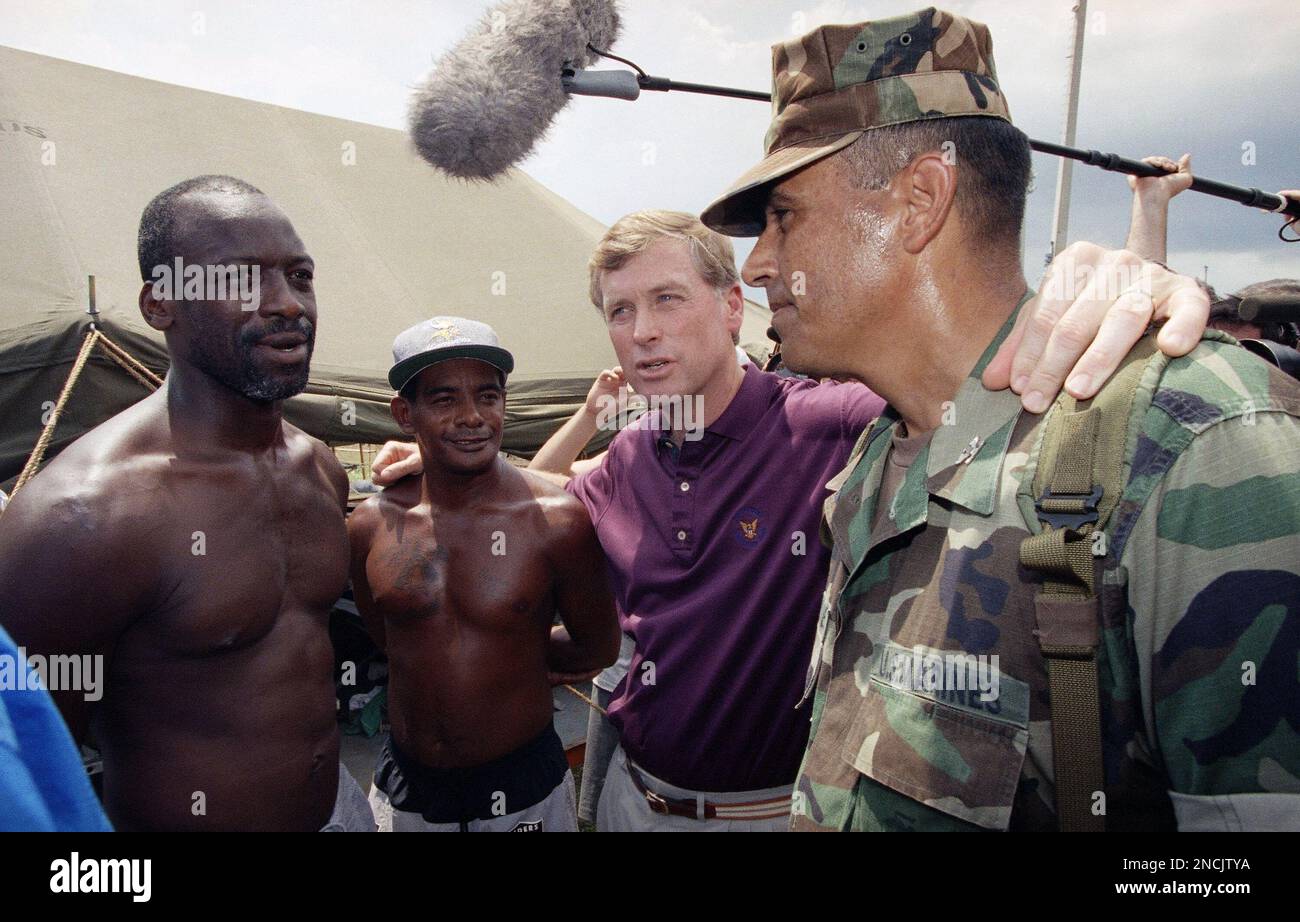 Unidentified victims of Hurricane Andrew, left, talk with Vice ...