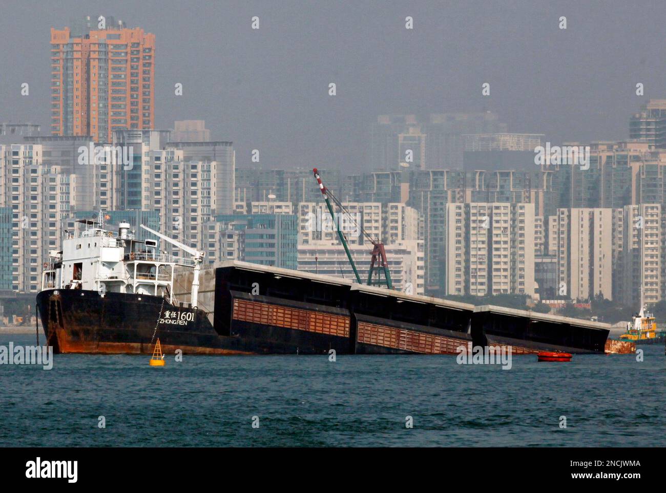 A semi-submersible barge from Guangzhou Salvage Bureau lies in Victoria ...