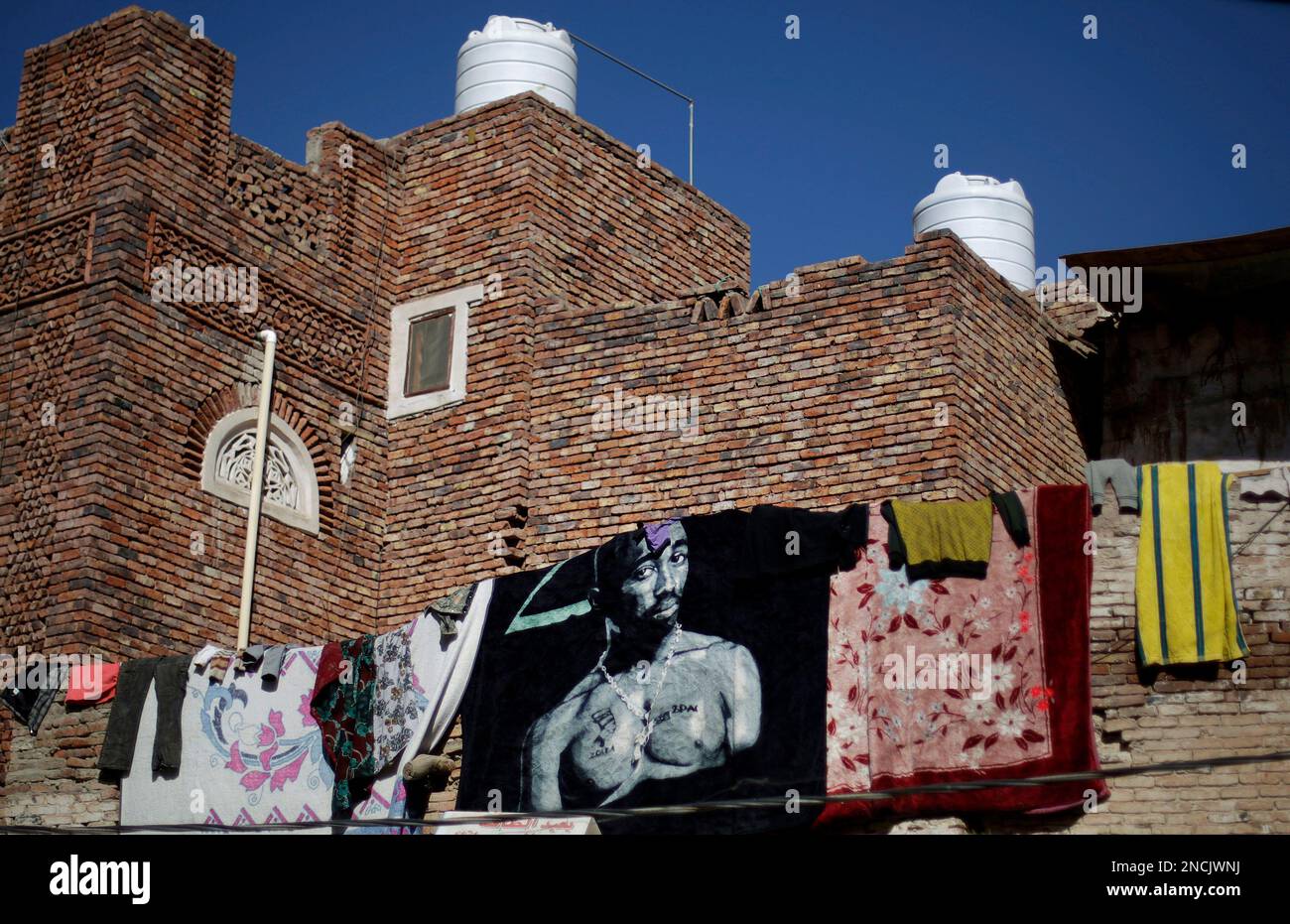A blanket depicting the image of the late U.S rapper Tupac Shakur is ...