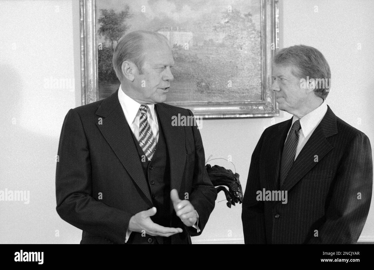 Former President Gerald Ford talks with President Jimmy Carter during ...