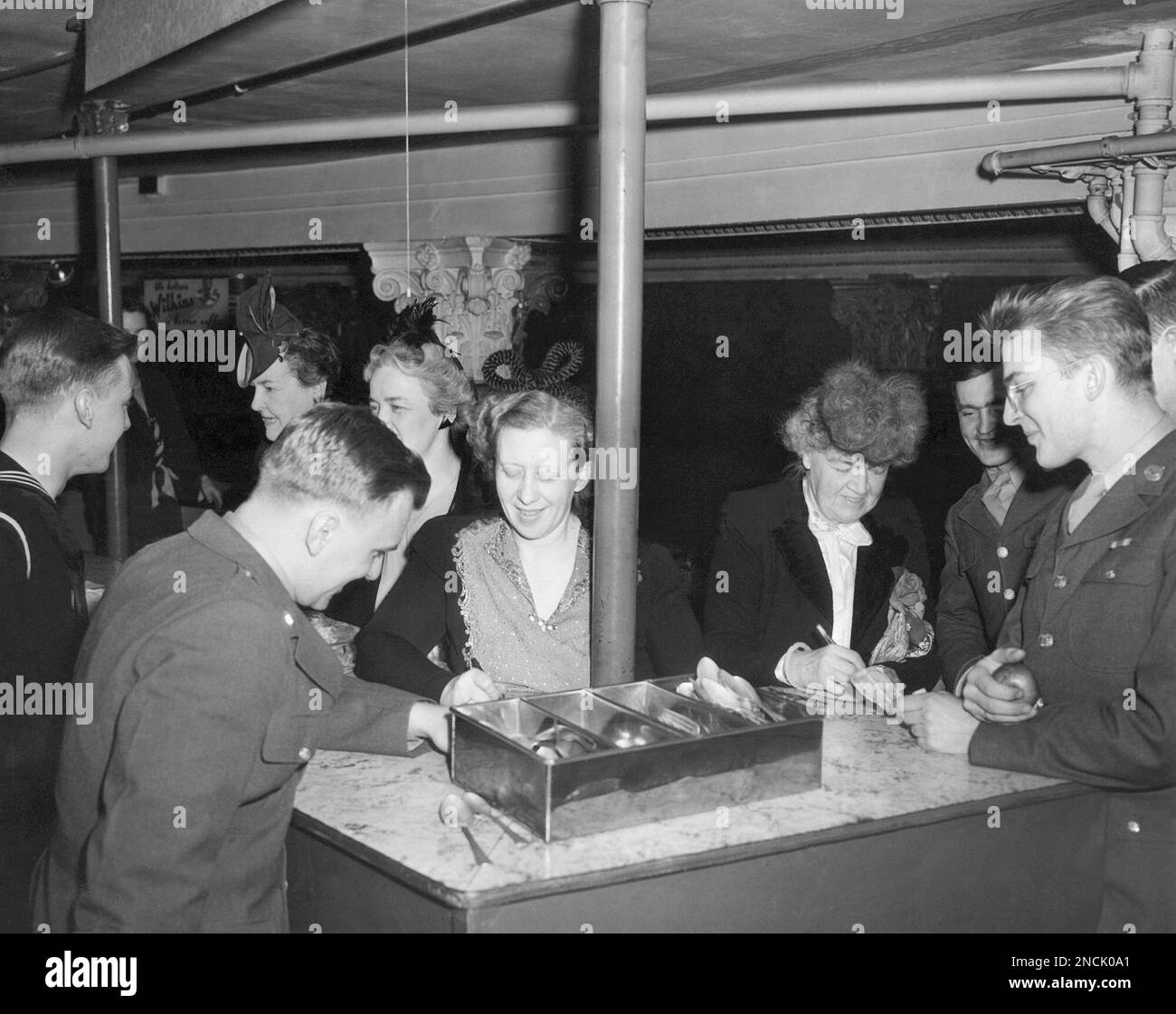 Congresswomen serving at the Washington, D.C., Stage Door Canteen ...