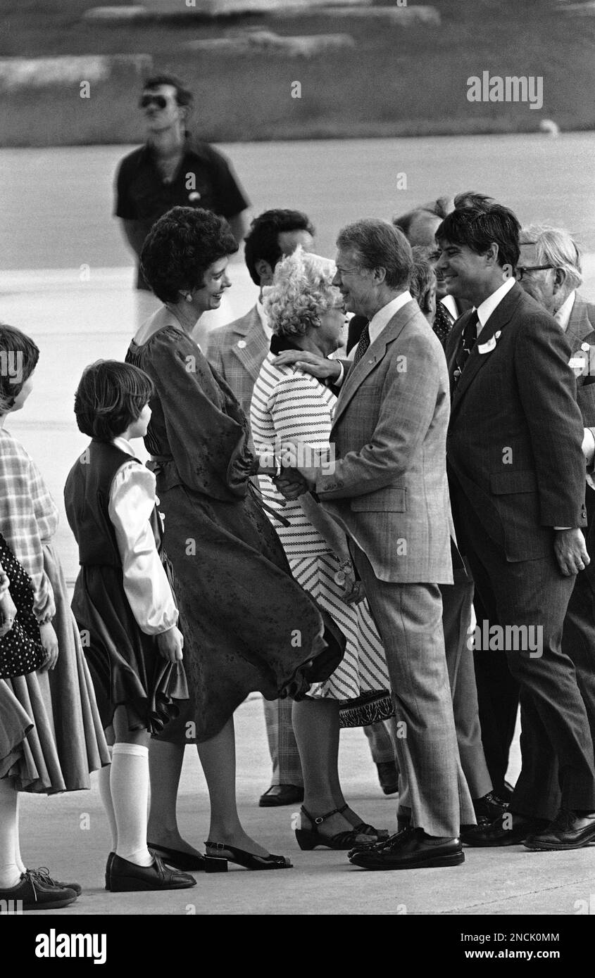 President Jimmy Carter is greeted on his arrival in Miami by Adele ...