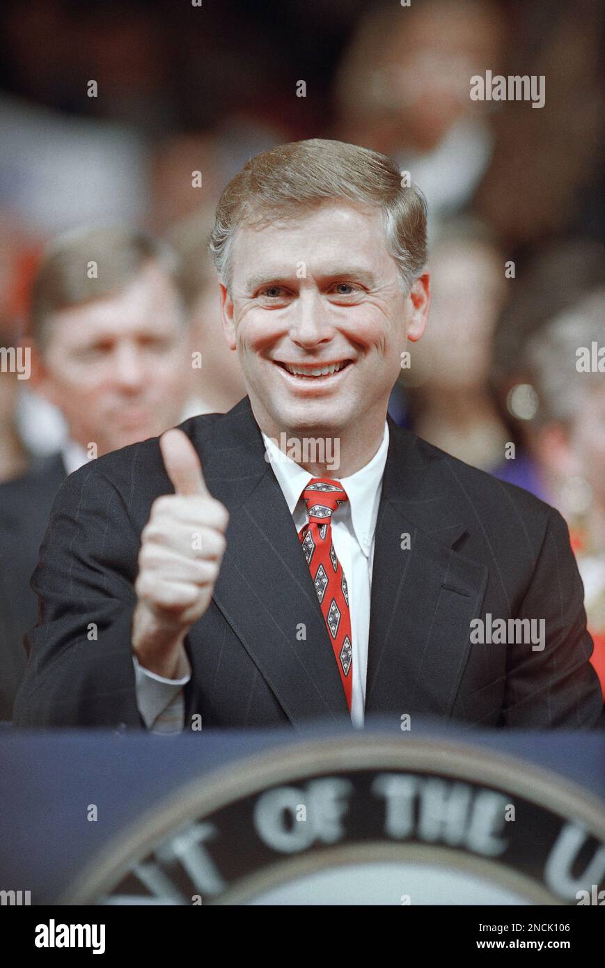 U.S. Vice President Dan Quayle gives the thumbs-up sign in support of ...