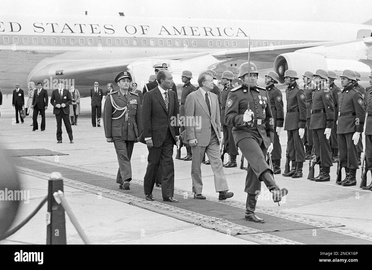 Egyptian President Anwar Sadat, left, and President Jimmy Carter review ...