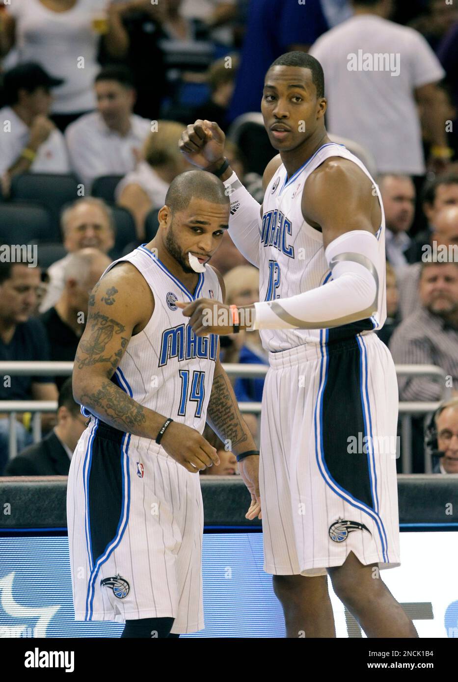 Orlando Magic's Jameer Nelson (14) and Dwight Howard greet each other ...