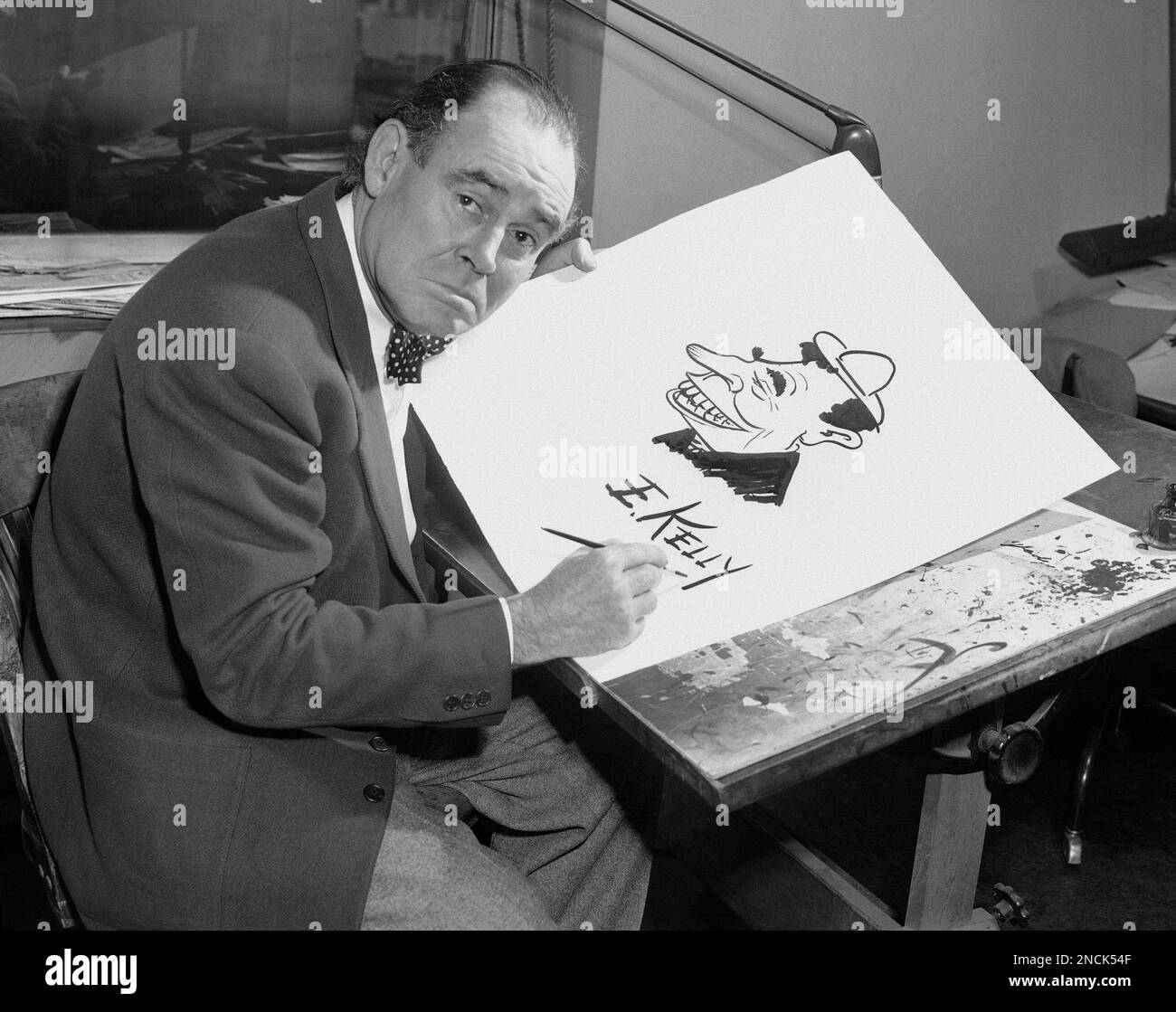 Emmett Kelly was a newspaper cartoonist before he took to spangles, and ...