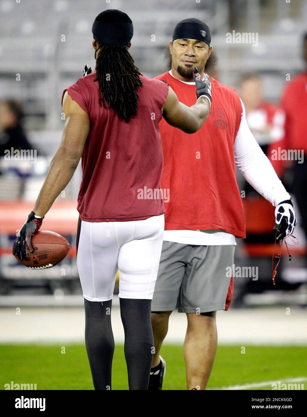San Francisco 49ers defensive tackle Isaac Sopoaga, right, greets ...