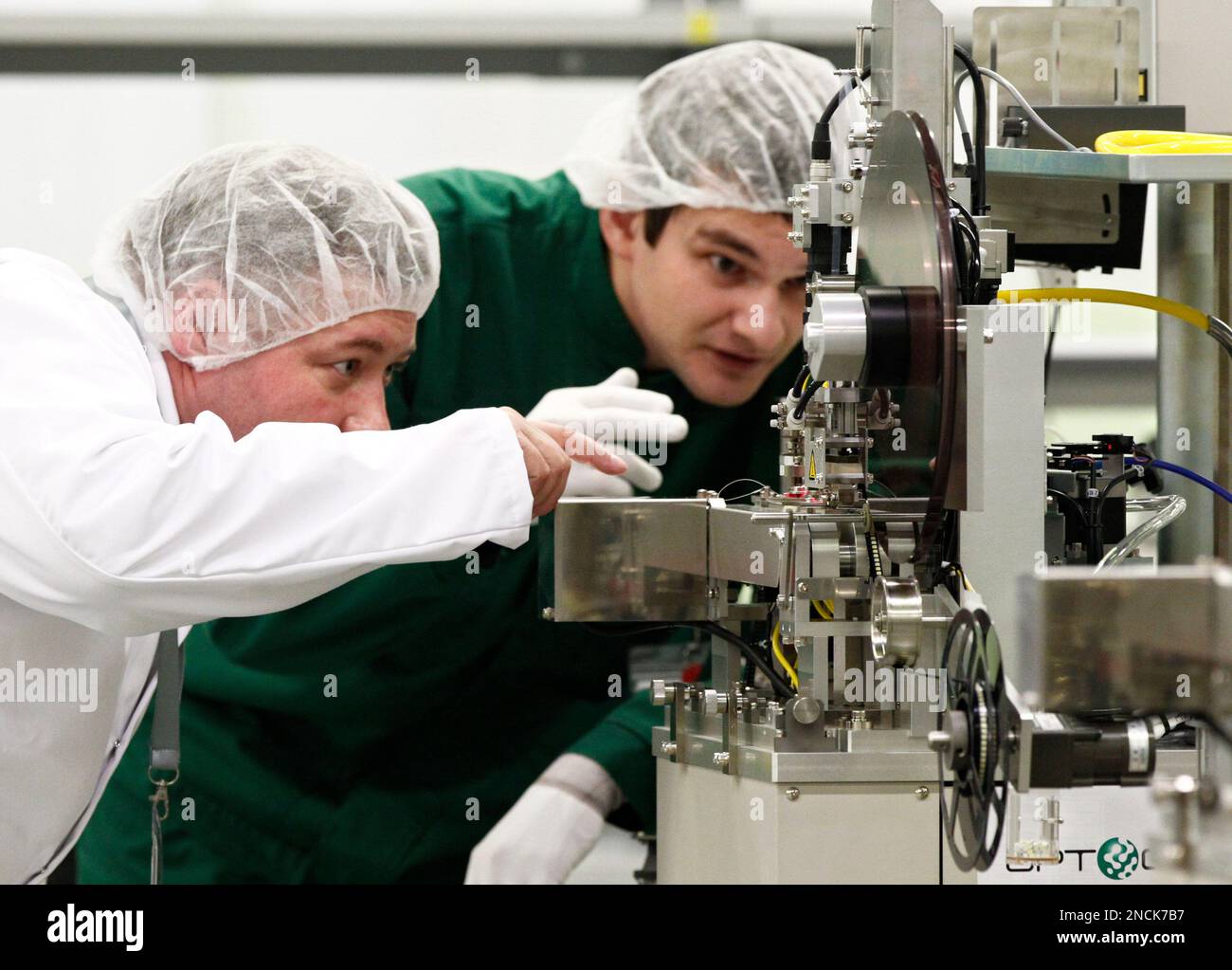 Workers seen at the Optogan new LED (light-emitting diodes) component ...