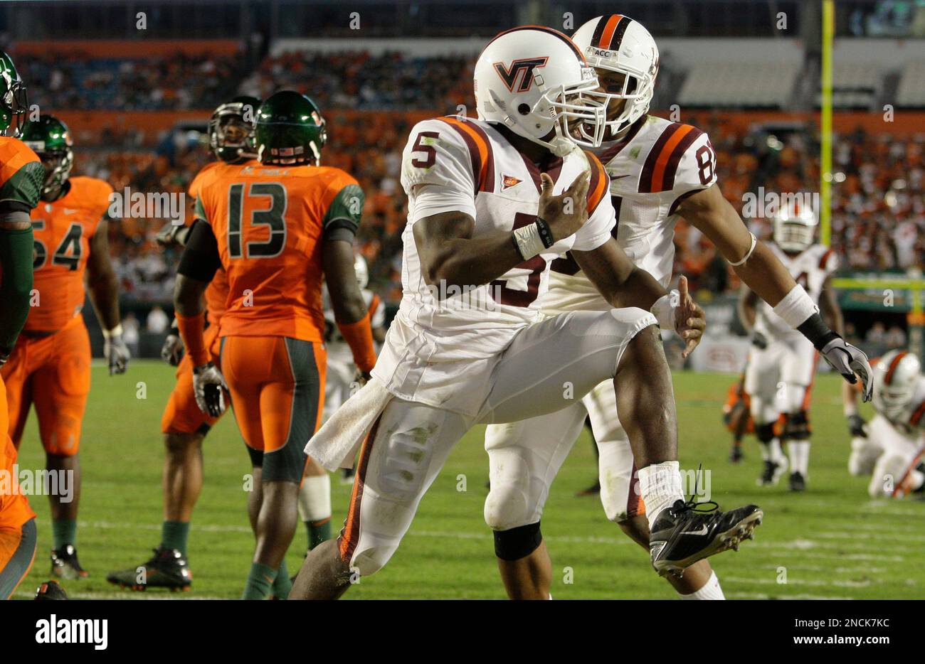 Virginia Tech Hokies quarterback Tyrod Taylor (5) celebrates with wide ...