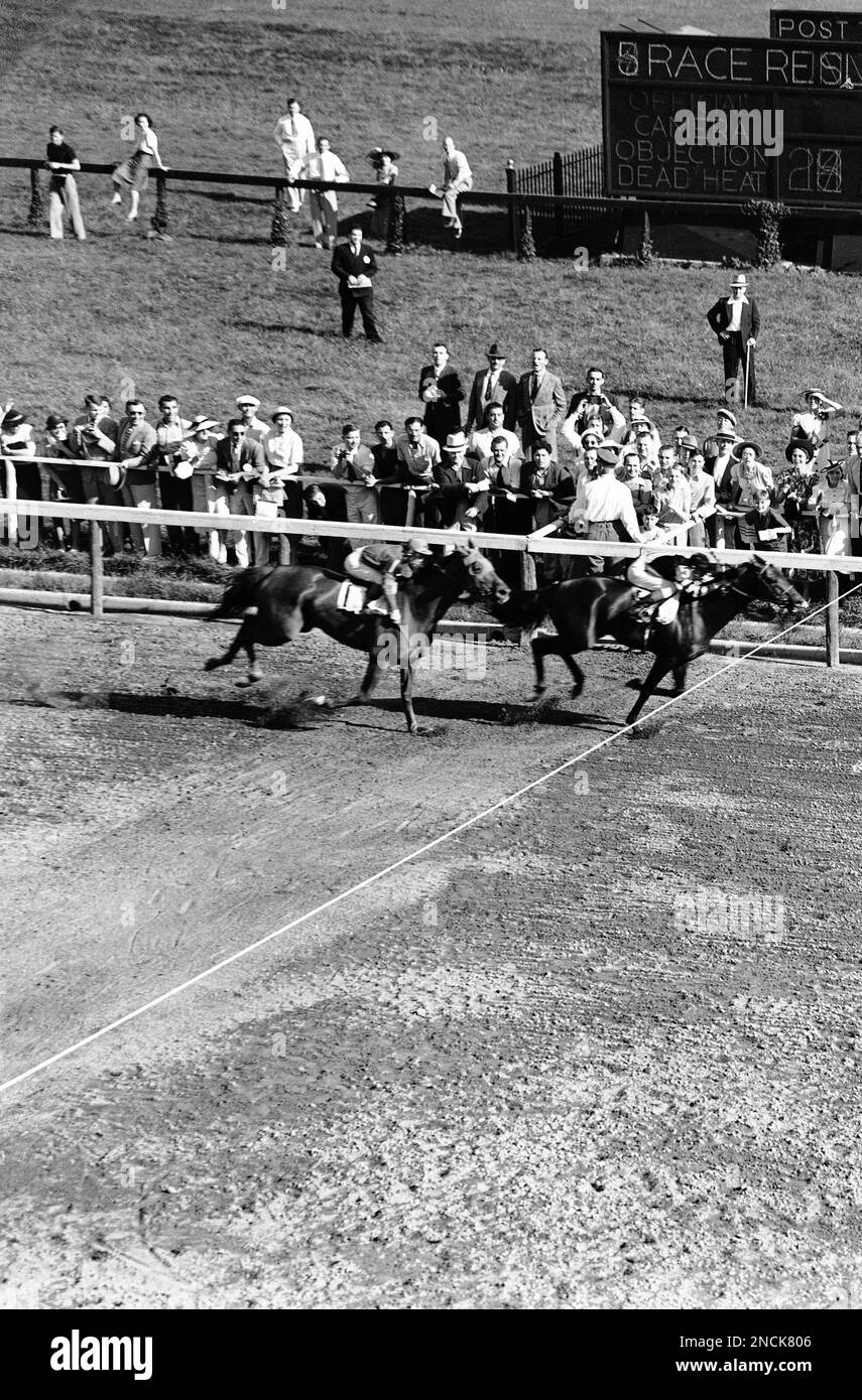 War Admiral, with Wayne Wright up, wins the Whitney, a mile-and-a ...