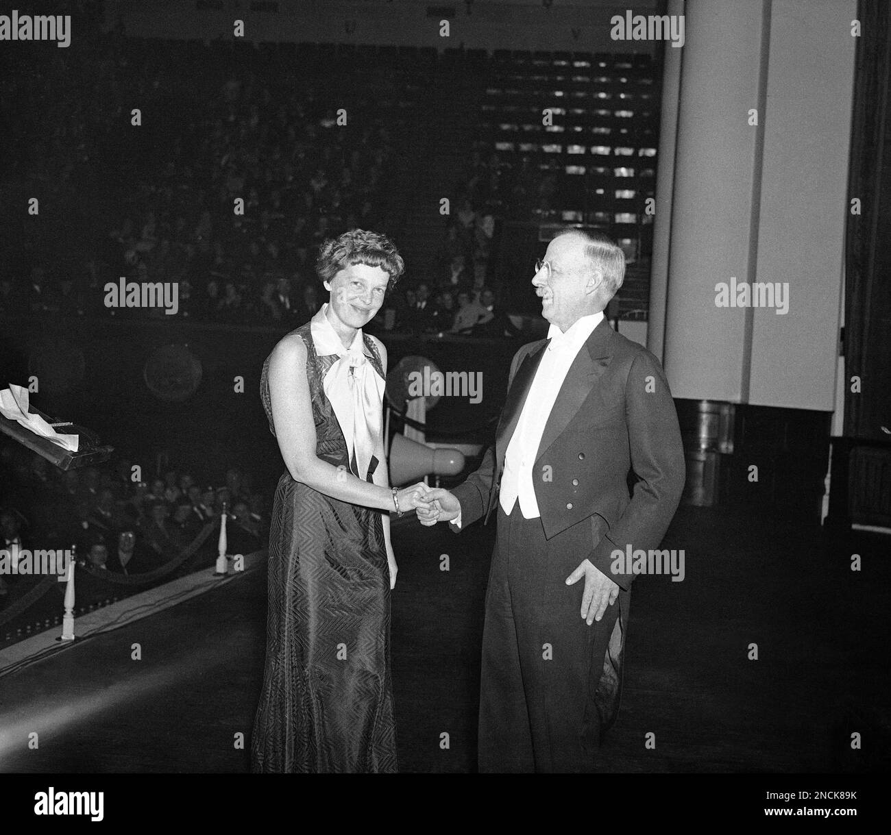Amelia Earhart, the noted aviatrix, with Gilbert H. Grosvenor ...