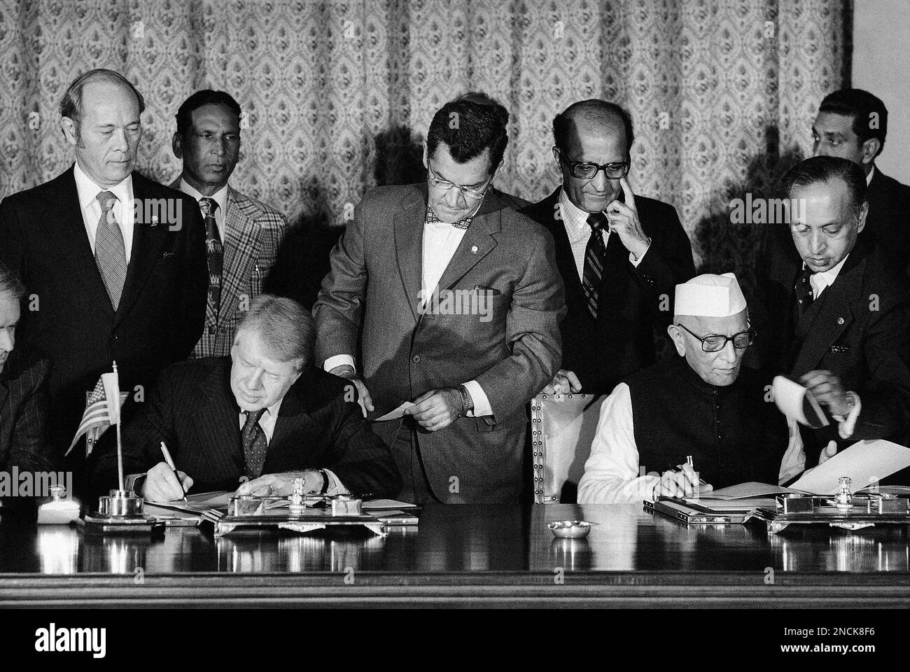 President Jimmy Carter and Indian Prime Minister Morarji Desai sign the ...